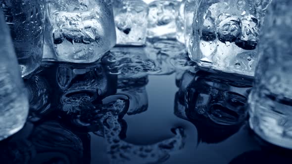Crystal Clear Transparent Ice Cubes Shining with Light. Ice Melting and ...