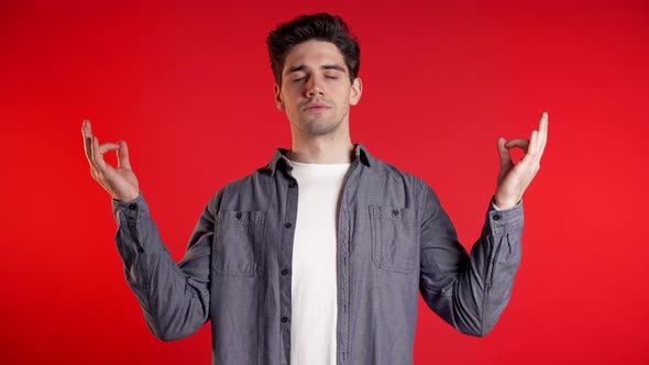 Calm Student Guy or Businessman Relaxing, Meditating. Handsome Man ...