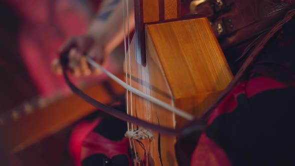 Folk Music Band Participant Plays Igil at Tribal Concerts, Stock Footage