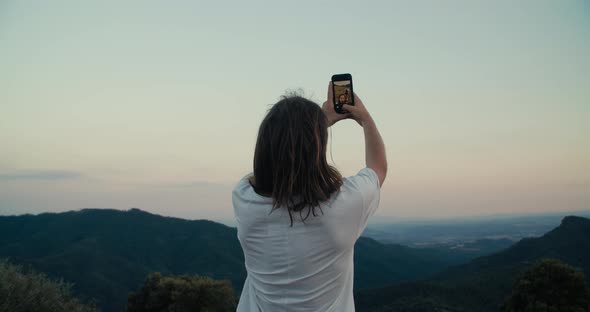 Blogger or Influencer on Mountain Trip Using Smartphone to Make Digital ...