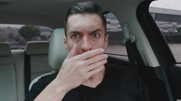 Young Male Driver Shocked and Surprised While Sitting in a Car on a ...