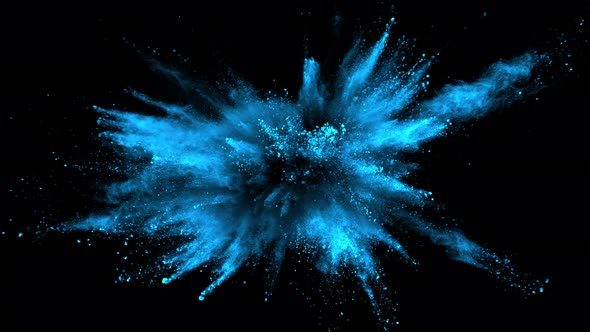 Super Slowmotion Shot of Blue Powder Explosion Isolated on Black ...