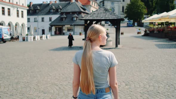 Back View of Pretty Blonde Woman Walking on the Street in Summer, Stock ...