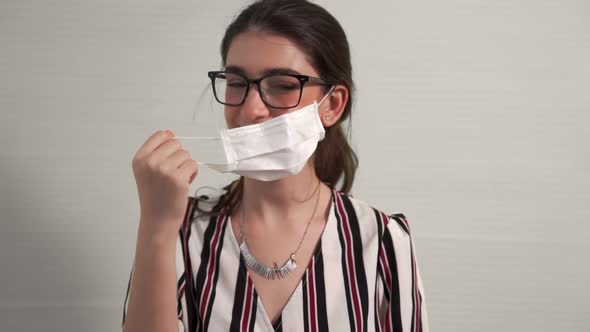 Young Woman Take Off Face Mask Removing From Face, Stock Footage ...