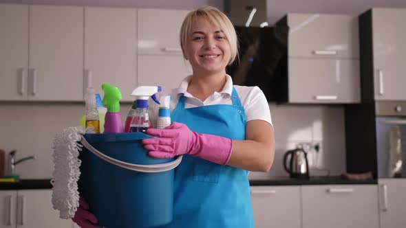Pretty Janitor Smiling at Camera After Work, Stock Footage | VideoHive