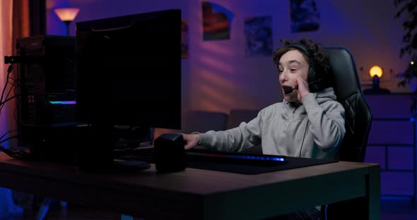 Child Pro Gamer Spends Time in Front of Monitor Playing Computer Games ...