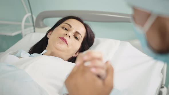 Closeup on a Face of a Woman in Labor Pushing Hard to Give Birth ...