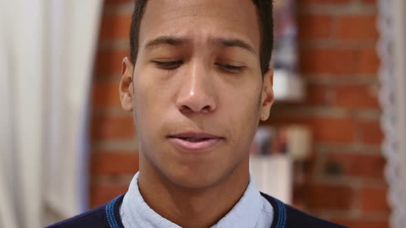 Sad Young African Man Feeling Upset and Lost Loft Background, Stock Footage