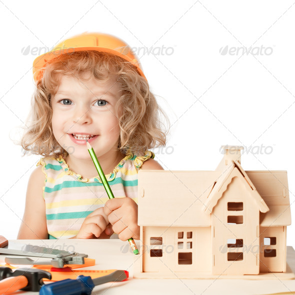 Happy child builds house Stock Photo by Sunny_studio | PhotoDune