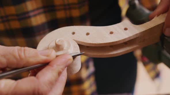 Female luthier at work in her workshop, Stock Footage | VideoHive