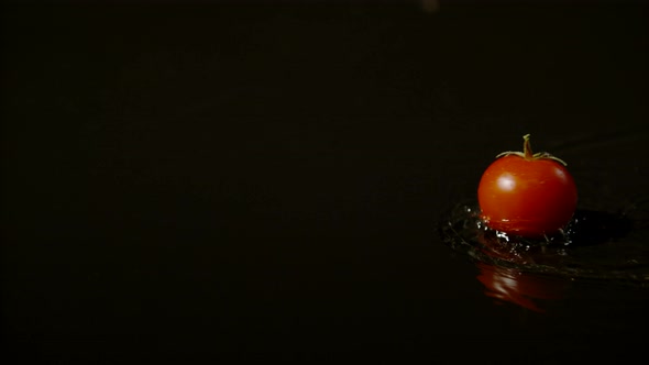 Tomato spinning in water, Ultra Slow Motion, Stock Footage | VideoHive