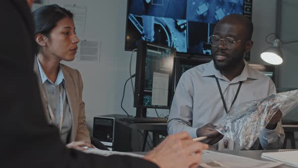 Forensics Showing Evidence to Detectives, Stock Footage | VideoHive