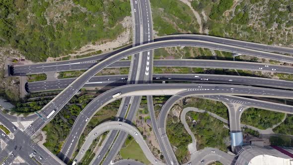 Massive multi level highway interchange with traffic on all routes ...