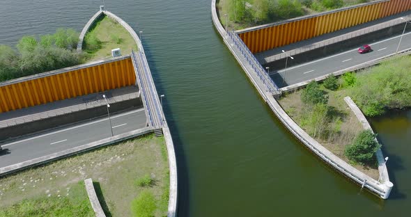 Aquaduct Veluwemeer water bridge with boat crossing above highway ...