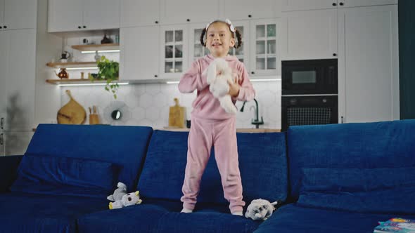 Adorable Little African American Girl Humping on Couch at Home Fooling ...