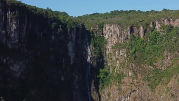 Drone shot of Mutarazi Falls in Zimbabwe - drone is reversing, flying ...
