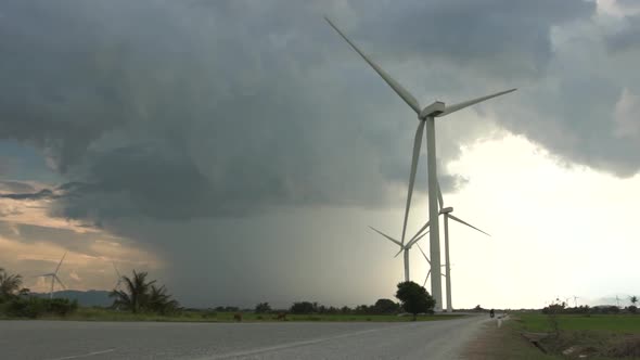 Wide Windmill Farm with Rotating Blades on Large Generators, Stock Footage