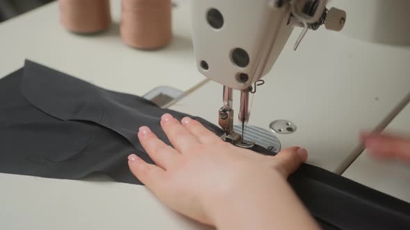 Sewing Machine Needle in Motion. Close-up of sewing machine needle ...