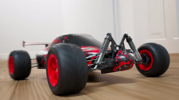 RC car indoor race. Miniature radio-controlled model driving fast in ...