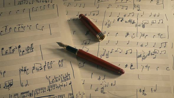 Writing Music Concept - Ink Pen On Sheet Music, Stock Footage | VideoHive