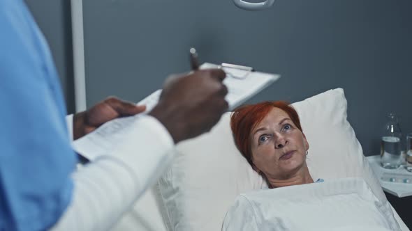 Doctor Interviewing Patient after Surgery, Stock Footage | VideoHive