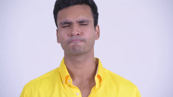 Face of Young Happy Indian Businessman Nodding Head Yes, Stock Footage