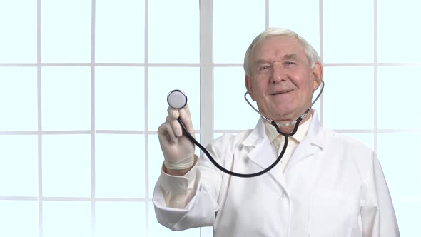 Very Old Doctor Using Stethoscope in Hospital., Stock Footage | VideoHive