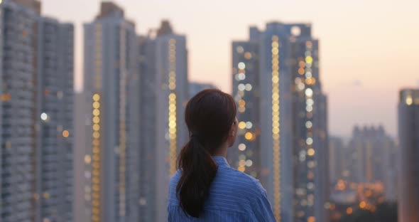Woman Look at The Apartment Building in City, Stock Footage | VideoHive