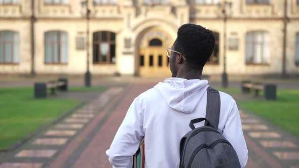 Back View Confident Young Student Walking to University Campus in Slow ...