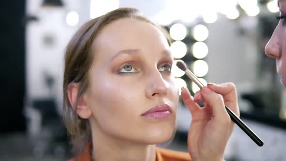 Close Up of a Model's Face During the Make Up Process, Stock Footage