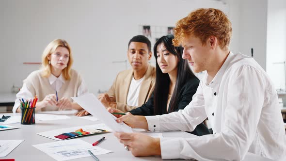 Group of Multiethnic Students Studying at Workshop Writing Task on ...