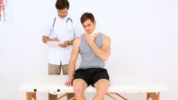 Physiotherapist Talking To Patient Wearing, Stock Footage | VideoHive