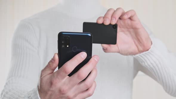 Scanning QR Code with a Modern Cold Crypto Wallet and Smartphone, Stock ...