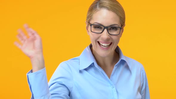 Friendly Office Manager Waving Hand, Saying Hello to New Colleagues ...