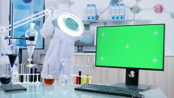 In Secure Laboratory a Desk with Green Screen PC Monitor, Stock Footage