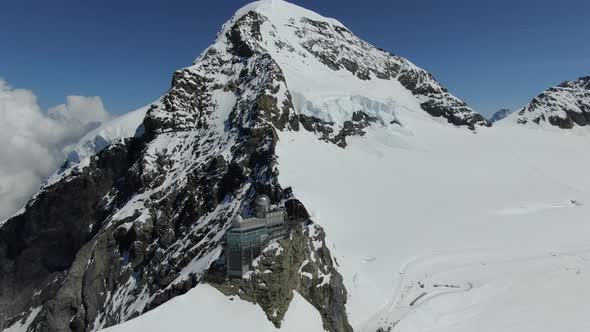Aerial shot of Sphinx astronomical observatory above Jungfraujoch ...