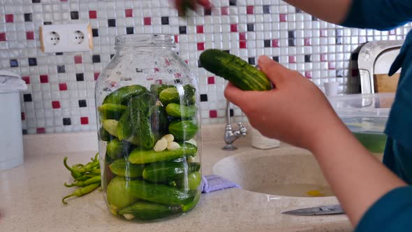 A woman is preparing summer pickles, making homemade pickles, Stock Footage