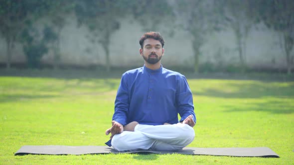 Indian man doing meditation in an Indian traditional outfit Kurta ...