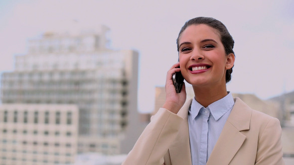 Thoughtful Beautiful Businesswoman Making A Call, Stock Footage | VideoHive