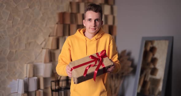 Man Throwing Box with Gift Congratulate with Birthday Slow Motion at ...