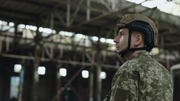 Serious Military Man Standing in Ruined Plant, Stock Footage | VideoHive