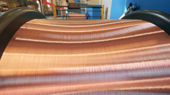 Close Up of Copper Wire Getting Reeled Onto a Massive Spool, Stock Footage