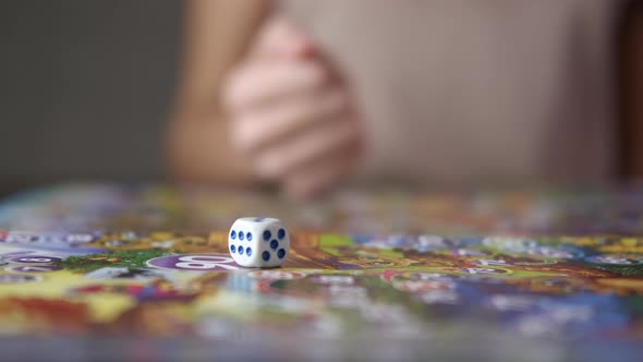 Child rolls a dice., Stock Footage | VideoHive