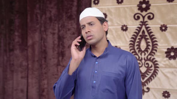 Muslim man talking on a call, Stock Footage | VideoHive