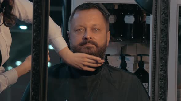 Barber finishing beard trimming, Stock Footage | VideoHive