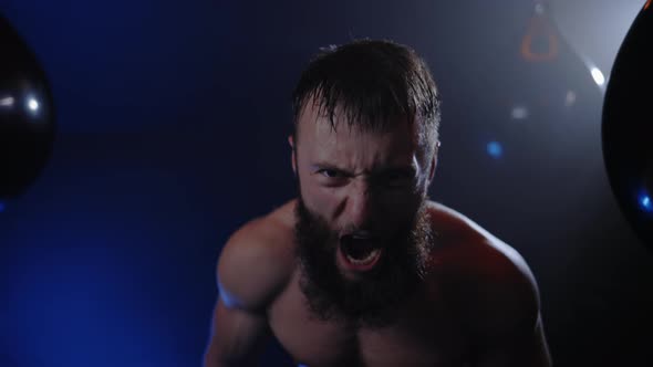 Portrait of the Sweating Aggressive Sport Man Boxer Looking at Camera ...