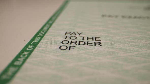 pay to the order of written on a check, Stock Footage | VideoHive