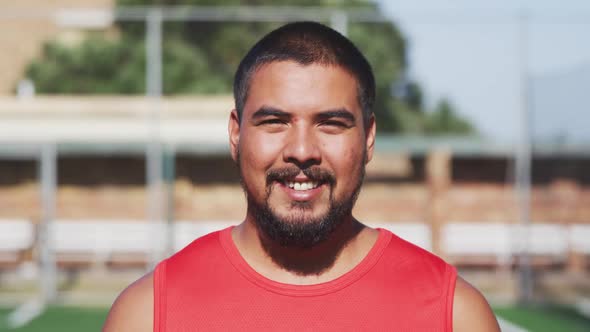Soccer player smiling at camera on the field, Stock Footage | VideoHive
