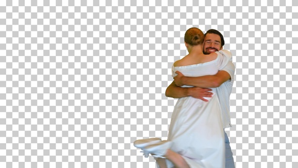 Young couple is running to each other, hug and spin, Alpha Channel ...