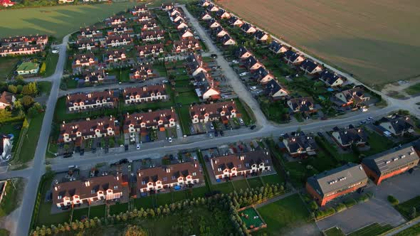 Aerial View of European Suburban Neighborhood at Sunset, Stock Footage